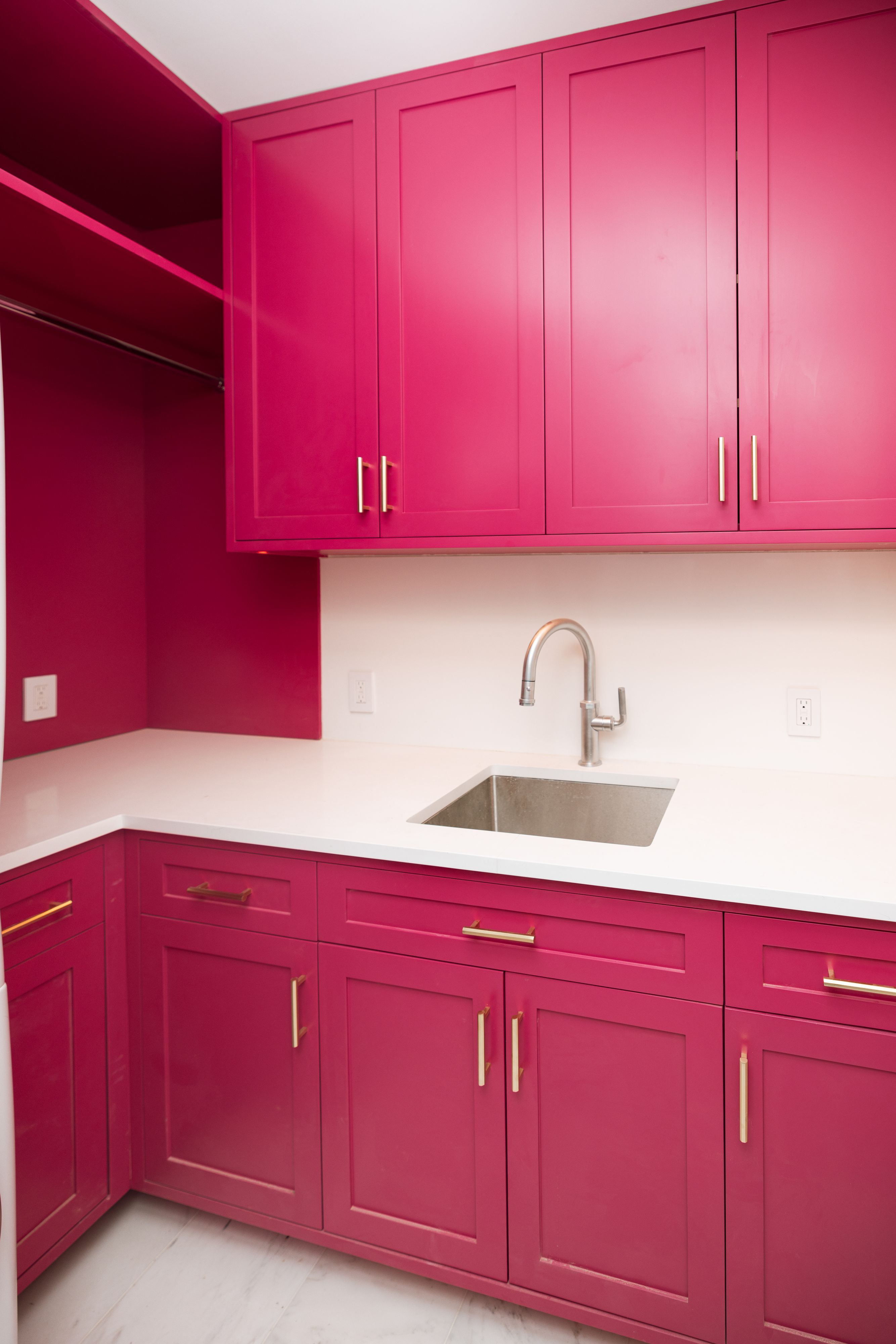 Pink Lacquer Laundry Room by NYC Millwork