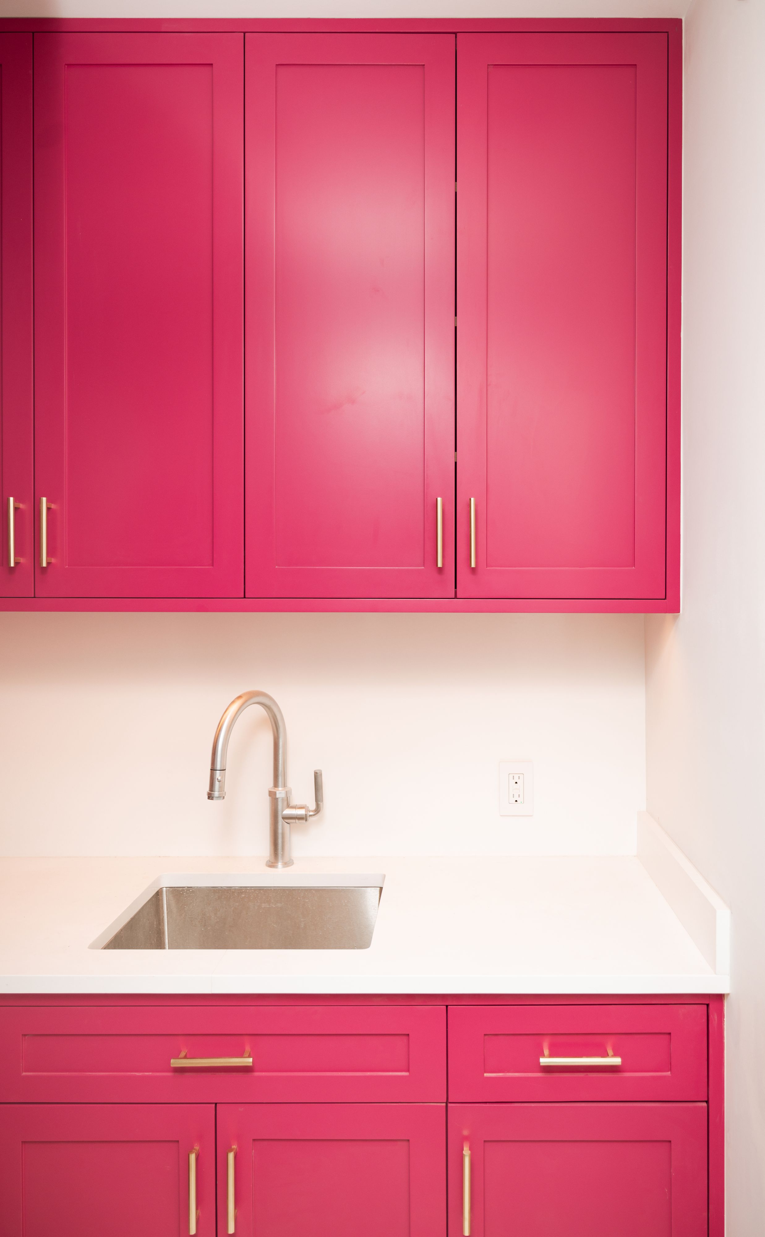 Pink Lacquer Laundry Room by NYC Millwork